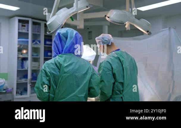 Standing surgeons wearing blue Stock Videos & Footage - HD and 4K Video ...