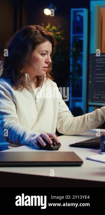 Vertical video Joyous woman doing software quality assurance ...