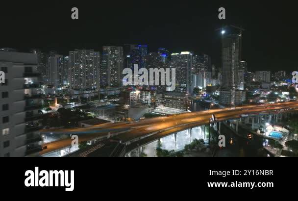 American urban landscape with skyscraper buildings over freeway ...