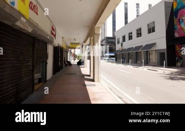 Miami, FL ,USA - August 24, 2024: Homeless people sleeping on the ...