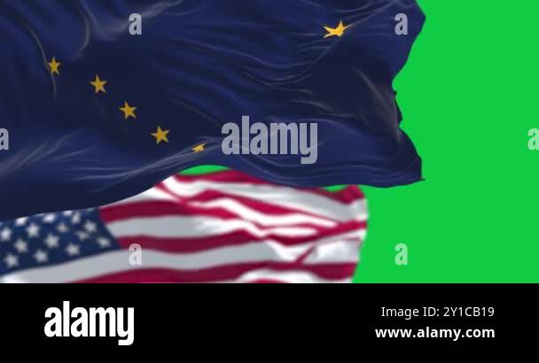 Alaska state flag waving in the wind with the national flag of the ...