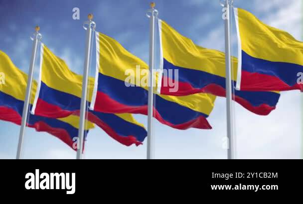 Colombia national flags waving in the wind on a clear day. Horizontal ...