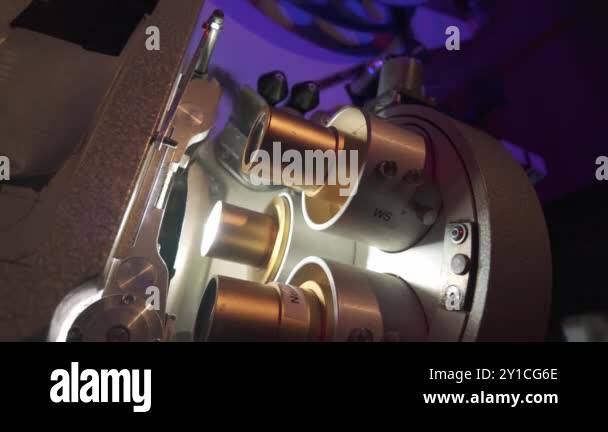 Changing lens of a cinema projector in a movie theater, 35mm Film ...