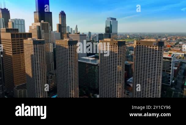 Approaching four similar buildings in the scenery of Chicago, IL, the ...