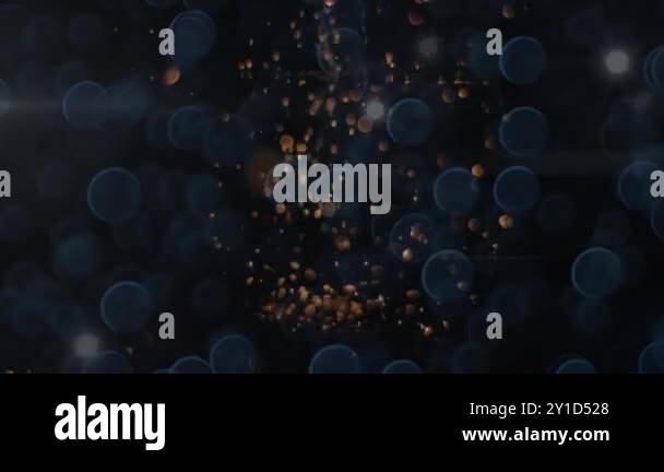 Bokeh light effects and floating particles animation over dark ...
