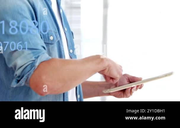 Using tablet, person interacting with floating numbers animation ...