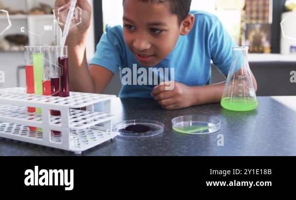 Conducting science experiment, boy observing chemical reactions over molecular structures ...