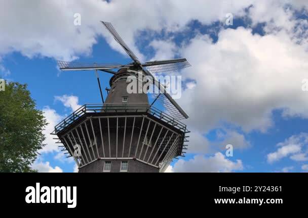 Traditional Dutch wind mill. Popular tourist landmark in the Amsterdam ...