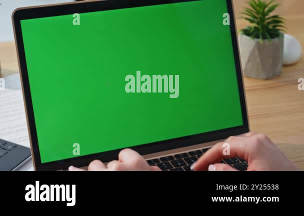 Closeup woman fingers texting green screen laptop at cabinet. Anonymous ...
