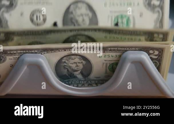 Dollar bills calculating electronic counter closeup indoors. Automatic ...