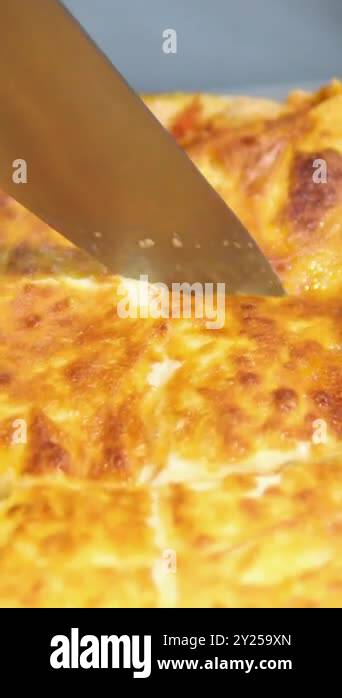 Beef lasagna step by step recipe. Layer of cream cheese. Close up video ...