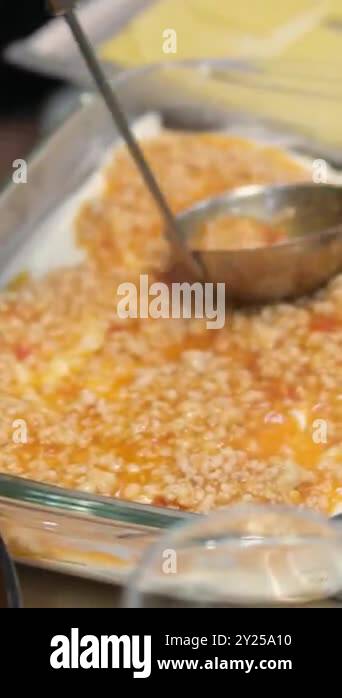 Beef lasagna step by step recipe. Layer of cream cheese. Close up video ...