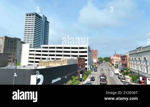 Pan Shot: An aerial view of downtown South Bend Indiana highlights its ...