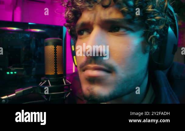 Close up face tense Indian Arabian Latino American man addict glued guy ...