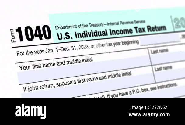 Filling tax form 1040 U.S. Individual Income Tax Return, close-up view ...