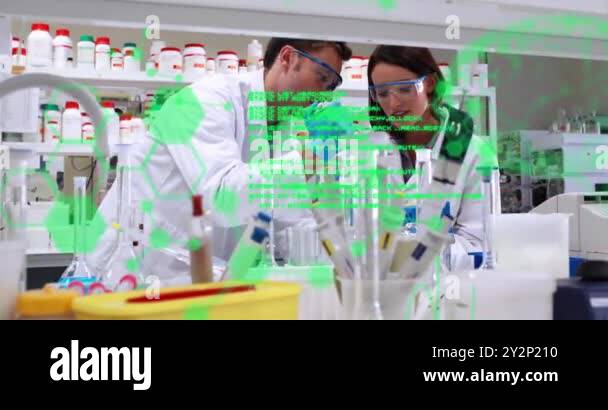 Scientists working in laboratory with chemical formulas animation over ... Scientists working in laboratory with chemical formulas animation over ...