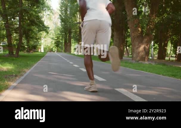 Active black man running in Stock Videos & Footage - HD and 4K Video ...