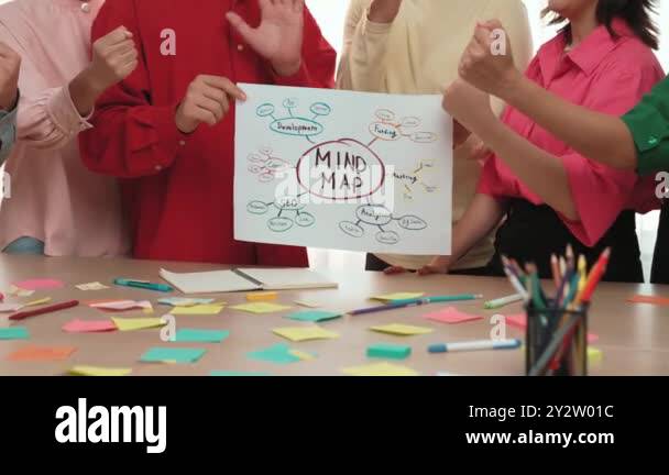 Slow motion successful happy and excited young businesspeople presents ...