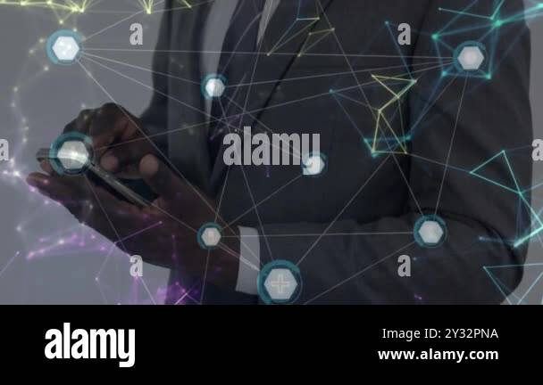 Using smartphone, businessperson surrounded by network connections and ...