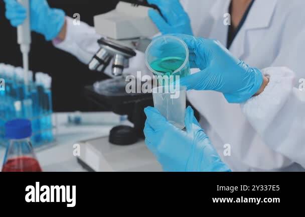 Scientist with flask Stock Videos & Footage - HD and 4K Video Clips - Alamy