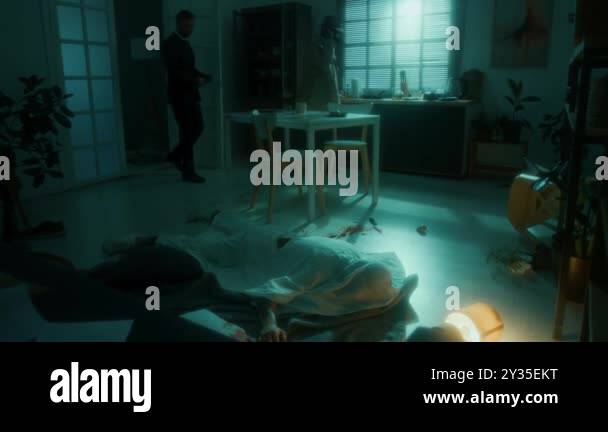 Detective and prosecutor walking together in dark room during night ...