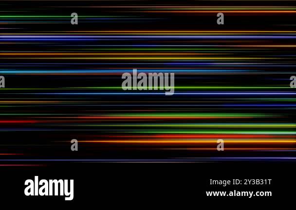 Abstract multicolored illuminated lines moving slowly sideways ...