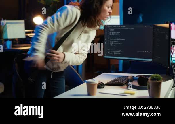 Computer scientist arriving in home office, ready to design and develop software applications ...