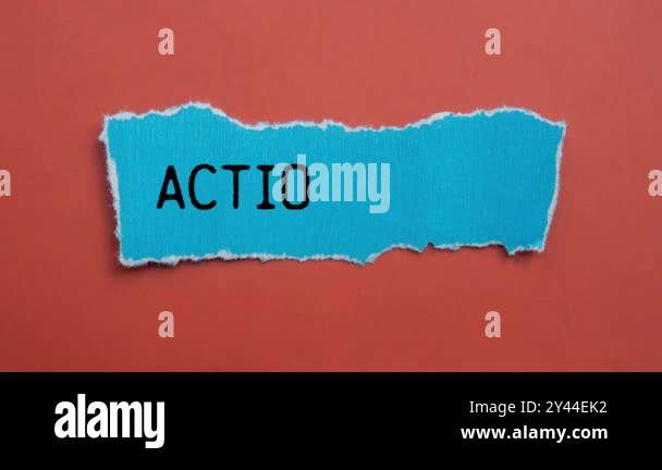 Action plan message writing on ripped blue torn paper piece on orange background. Conceptual ...
