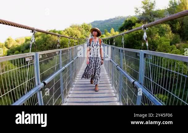 Woman girl walking bridge river Stock Videos & Footage - HD and 4K ...