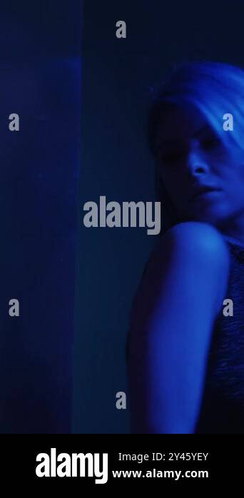 Vertical video. Neon silhouette. Blur reflection. Double exposure light ...