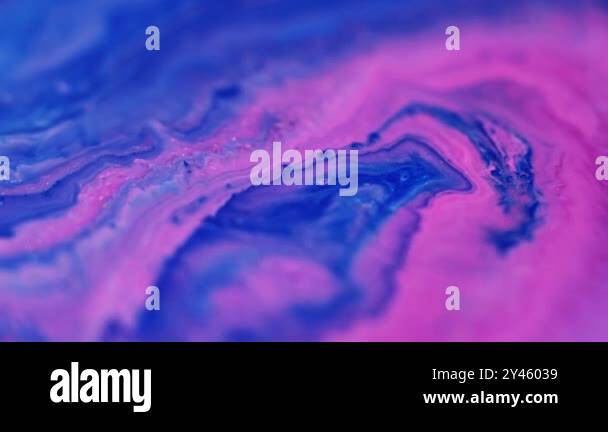 Marble ink. Fluid spill. Defocused blue pink color liquid emulsion ...
