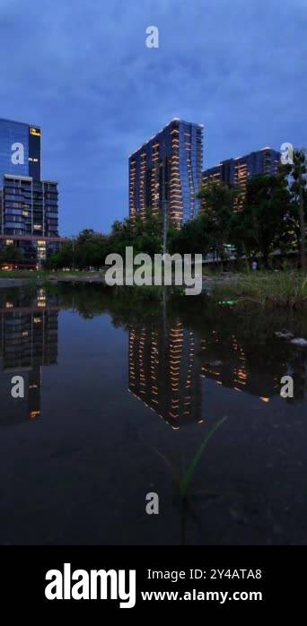Asia big city with high rise building illuminated by light at twilight ...