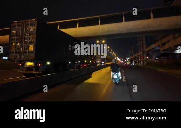 Container trailer with tractor transport cargo, lorry on night street ...
