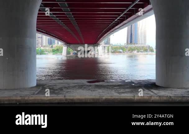 Ba Son cable bridge at Ho Chi Minh city, with big bridge piers, cargo ...