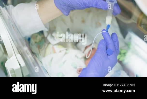 Premature baby girl Stock Videos & Footage - HD and 4K Video Clips - Alamy