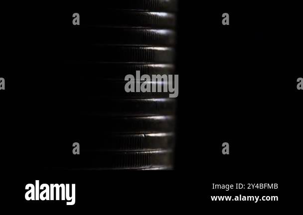 Stack of brown coins in close-up, texture of old coins, dark background ...