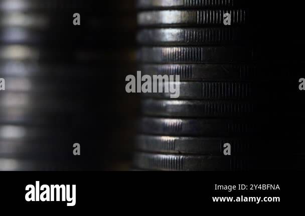 Stack of brown coins in close-up, texture of old coins, dark background ...