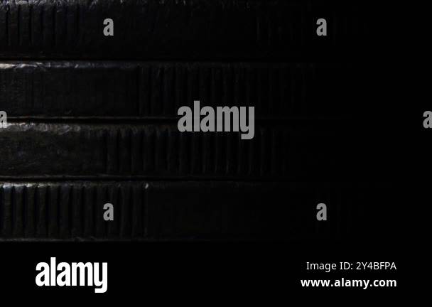 Stack of brown coins in close-up, texture of old coins, dark background ...