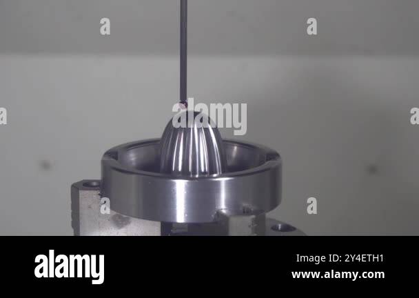Close up scene the CMM probe measuring the mold parts on machining ...