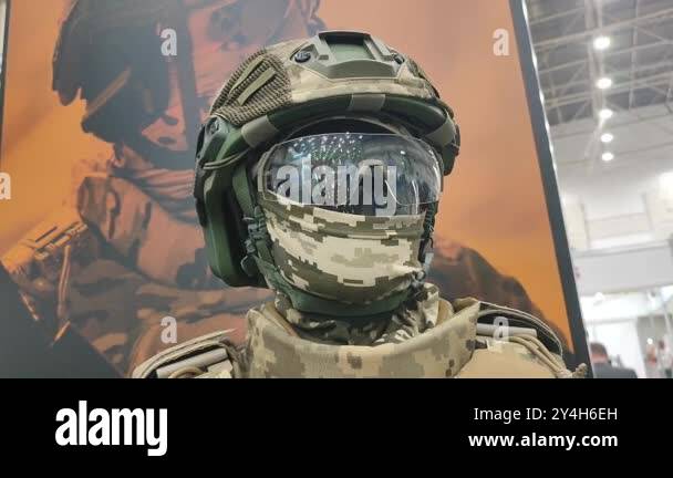 Protective helmet, balaclava and safety glasses on a dummy. Modern ...