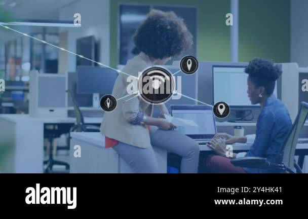 Collaborating in modern office, diverse colleagues with network ...