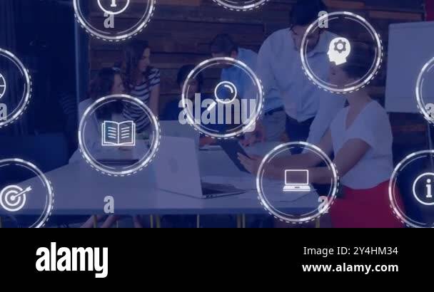 Business team collaborating at table with data processing animation overlaid. Teamwork ...