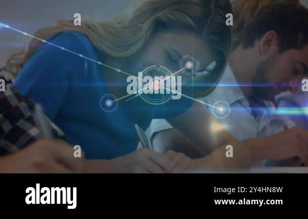 Network connections and data points animation over students studying in ...