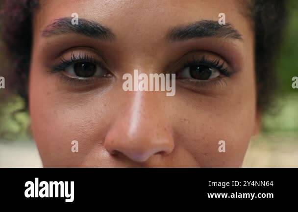 Close up cropped view female half face open eyes blink woman girl lady ...