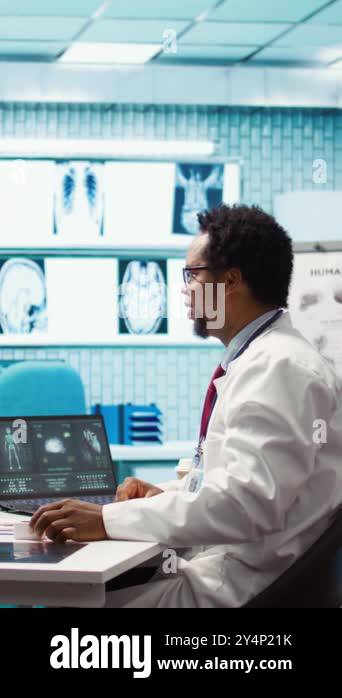 Vertical Video Expert evaluating diagnostic results with a patient in a ...