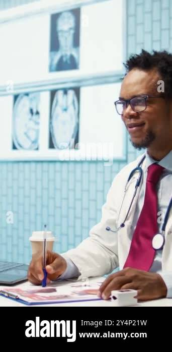 Vertical Video Doctor and patient discussing diagnostic results in a ...
