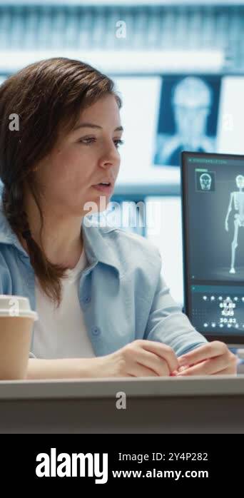 Vertical Video African american medic presenting the diagnostic reports to a female patient ...