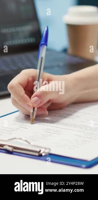 Vertical Video Female doctor highlighting the medical instructions and ...