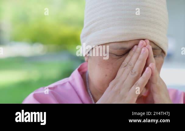 Sad, senior woman and person with Cancer sitting in a wheelchair ...