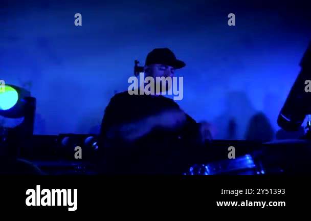 The drummer cool plays the rock concert. A man energetically drumming ...